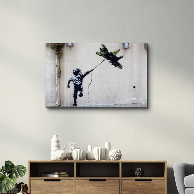 Banksy - fighter jet kite | Glass Wall Art | Artdesigna